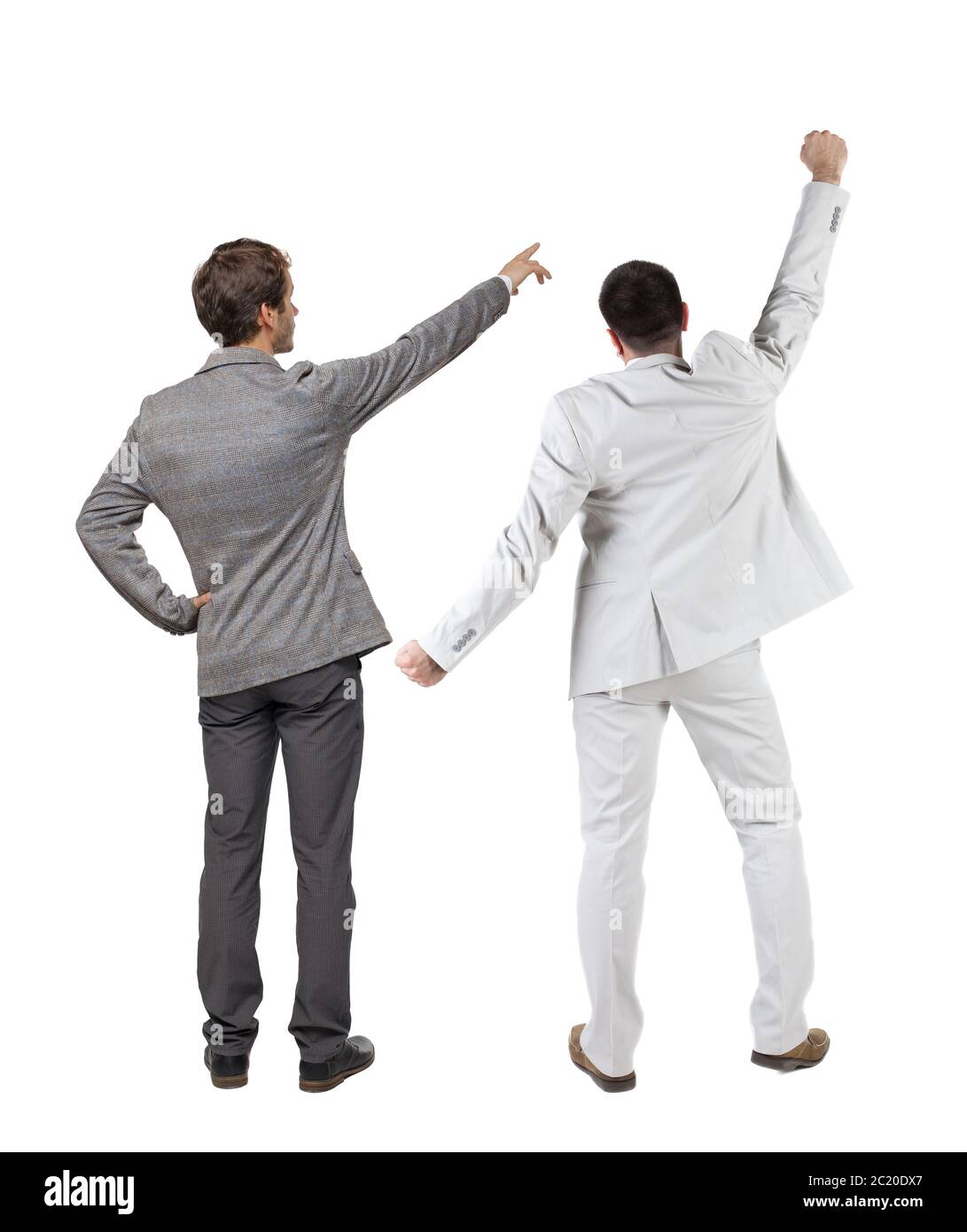 Back view of business man and business woman in suit pointing. Business ...