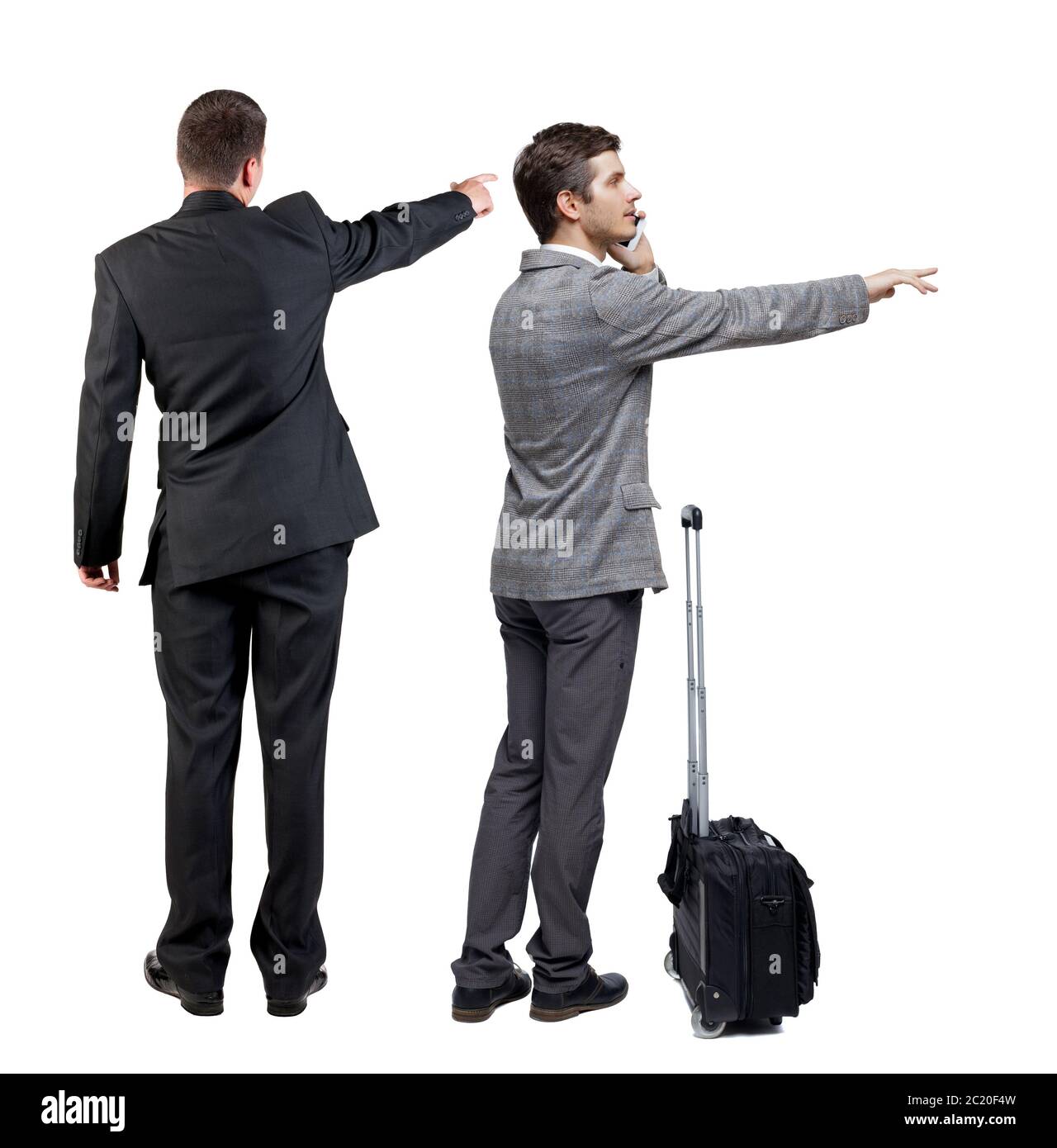 Back view of two business men in suit pointing. Business team ...