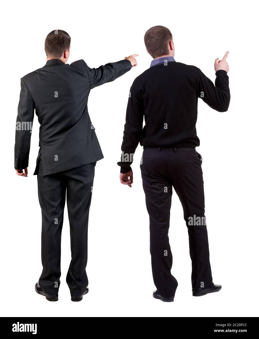 Back view of business man and business woman in suit pointing. Business ...