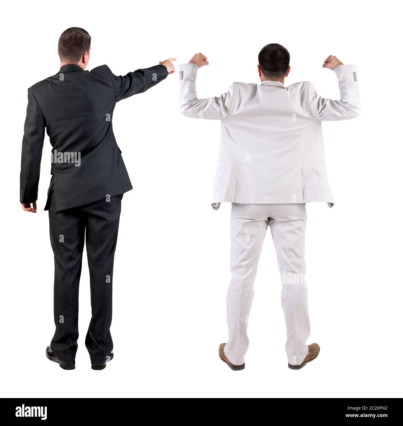 Back view of business man and business woman in suit pointing. Business ...