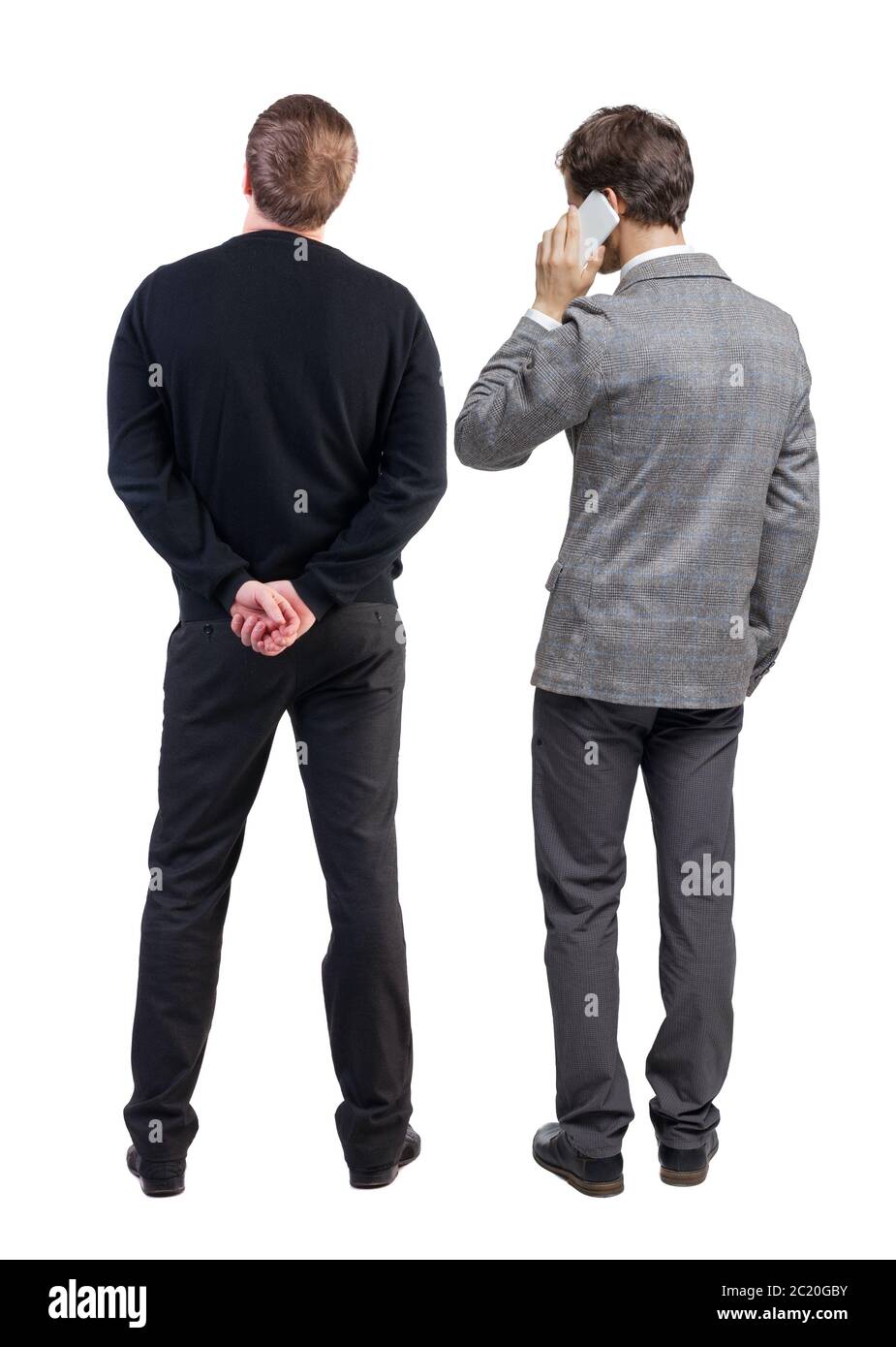 Back view of two business man in suit with mobile phone. Business team ...