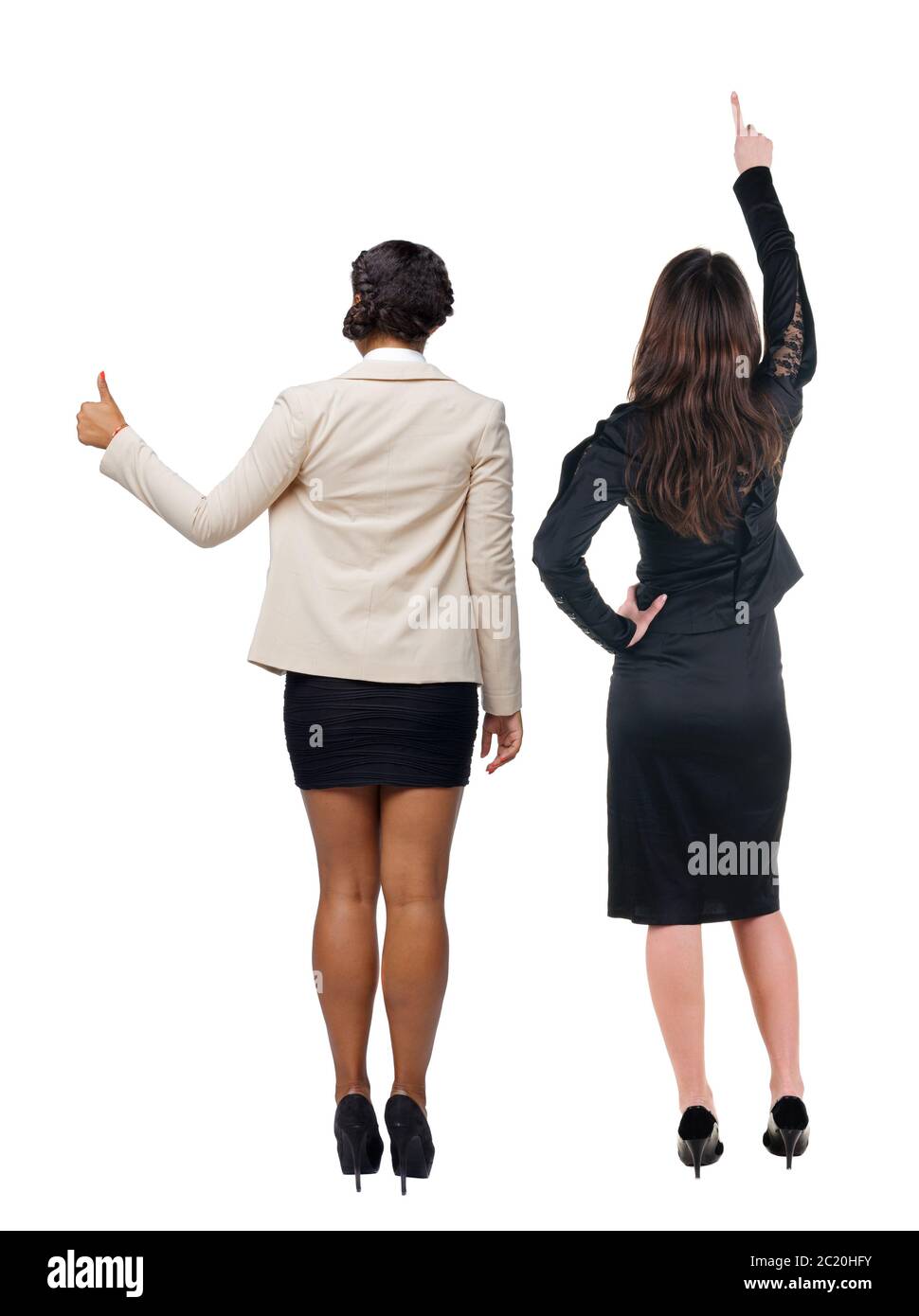 Back view of business team pointing. Two businesswoman. Rear view ...