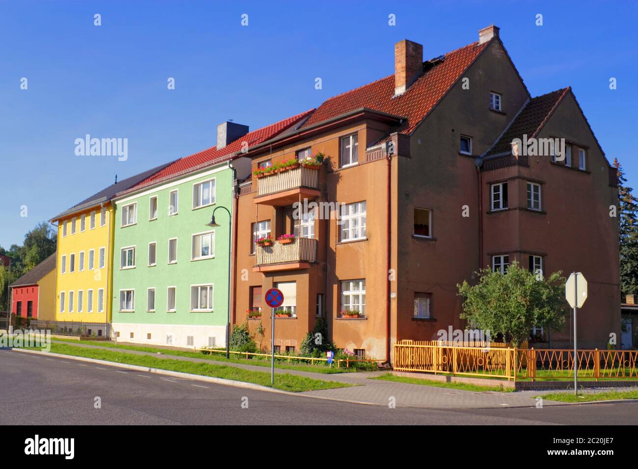 Colourful row of houses Stock Photo - Alamy