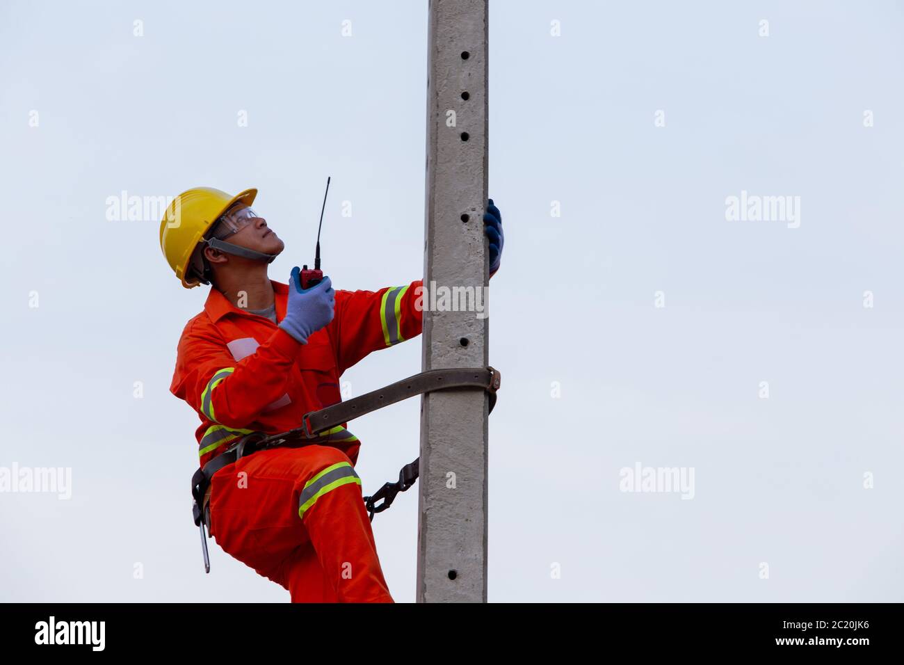 Electrician on electricity pole hi-res stock photography and images - Alamy