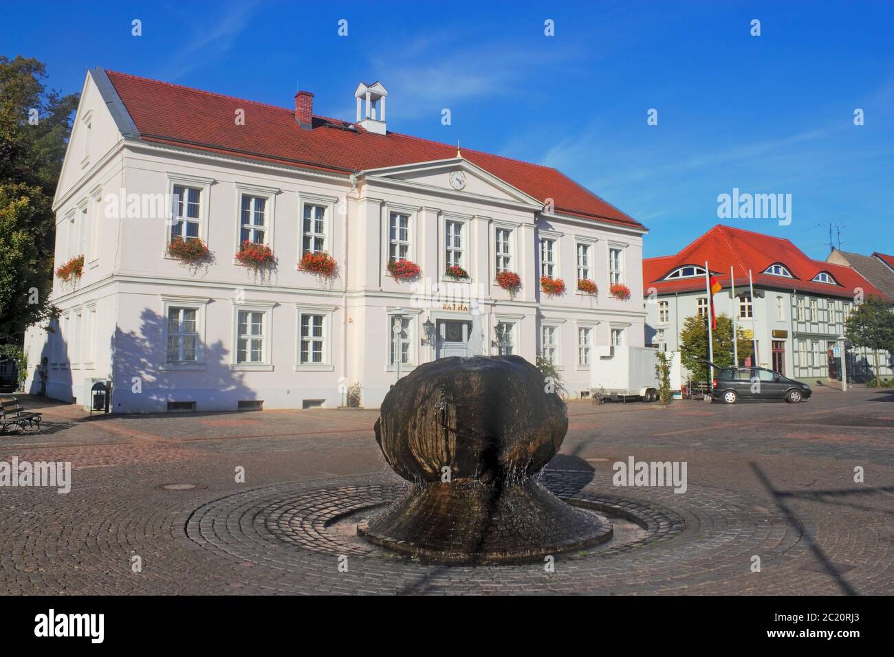 Town hall with fountain Stock Photo - Alamy