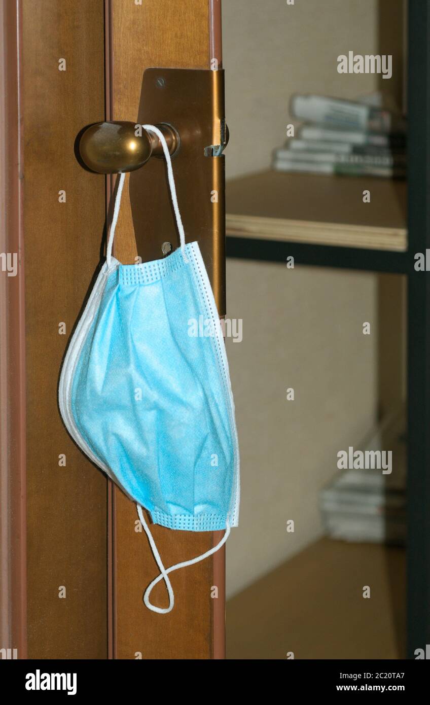 Mask hanging on door hi-res stock photography and images - Alamy