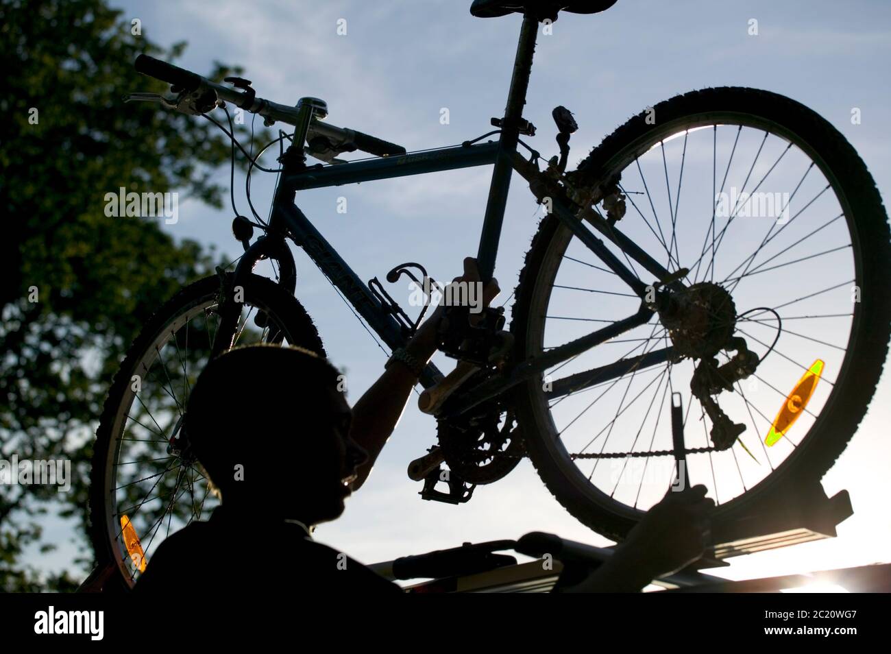 Mountain bike on car roof Stock Photo - Alamy