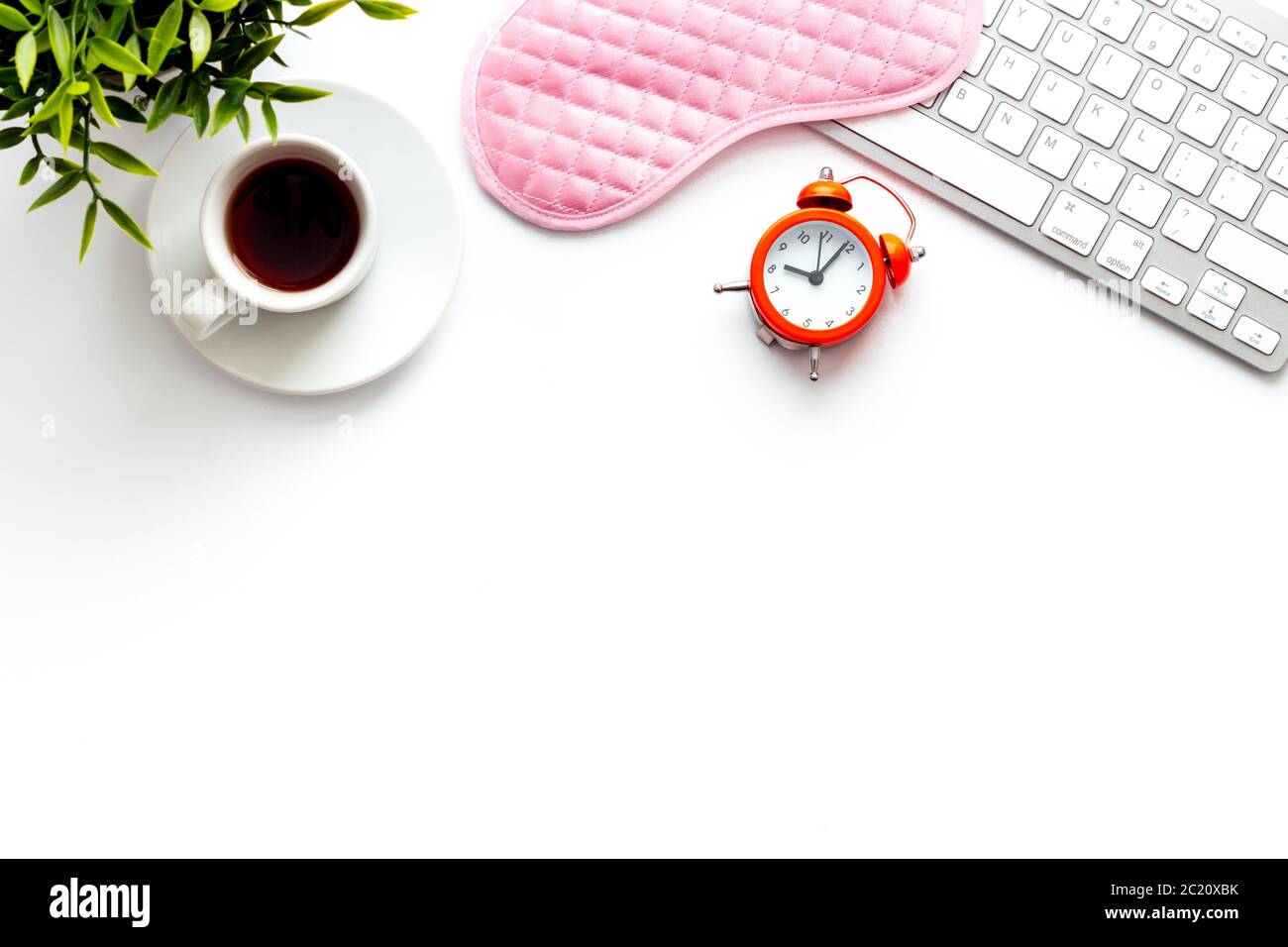 hard work without rest. Concept with sleep mask and laptop top-down ...