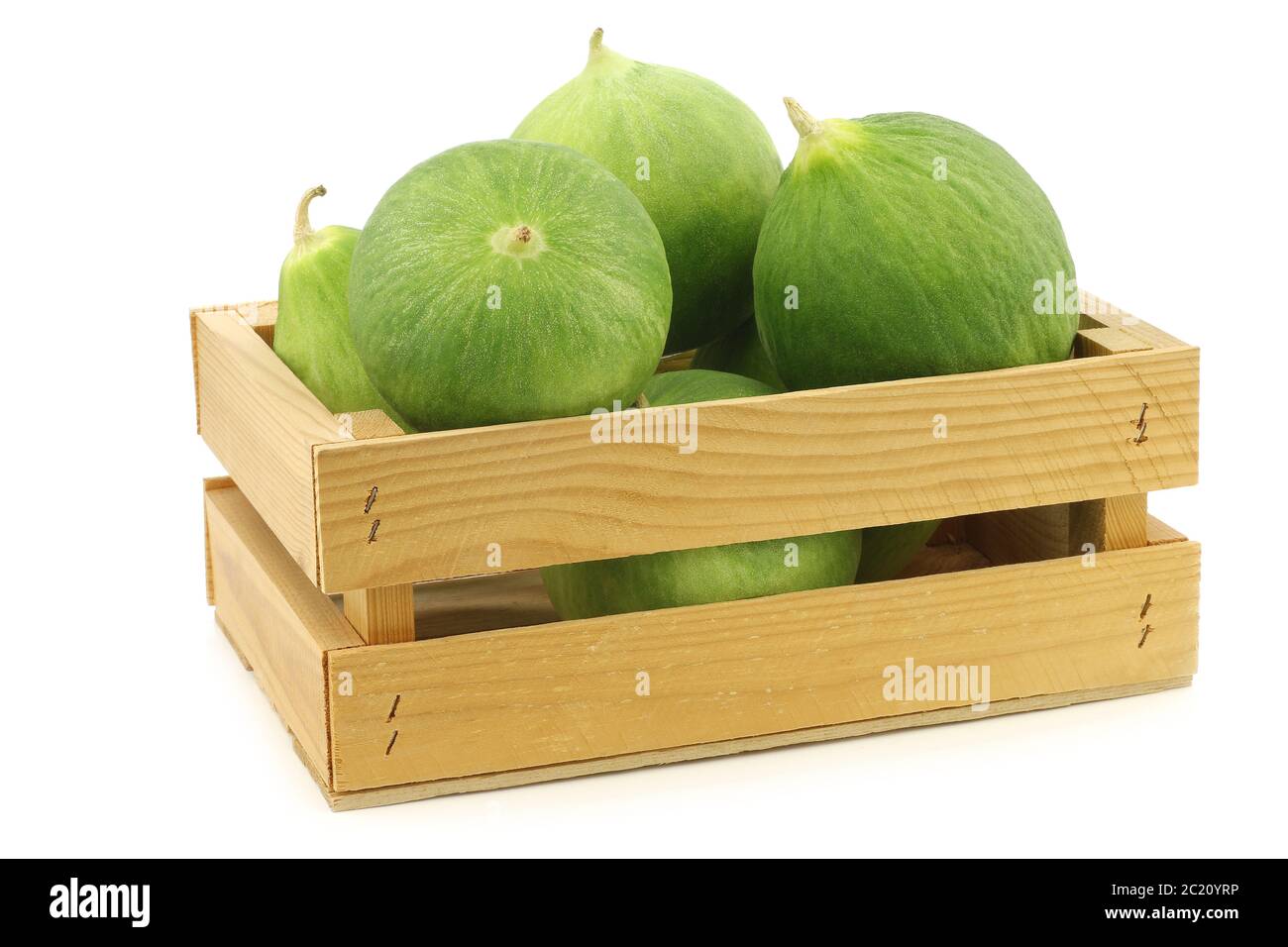 Fresh cumelo's (mix between a cucumber and a melon) in a wooden crate ...