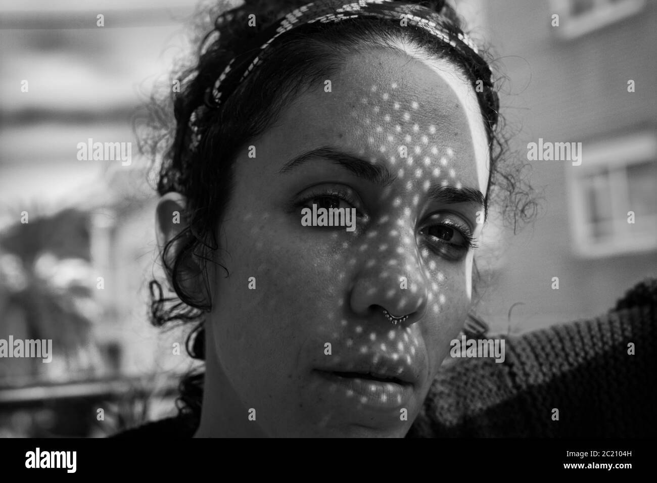 Black and white woman portrait hit by the sunlight Stock Photo - Alamy