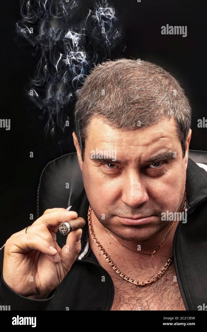 Close up portrait man gun looking hi-res stock photography and images ...