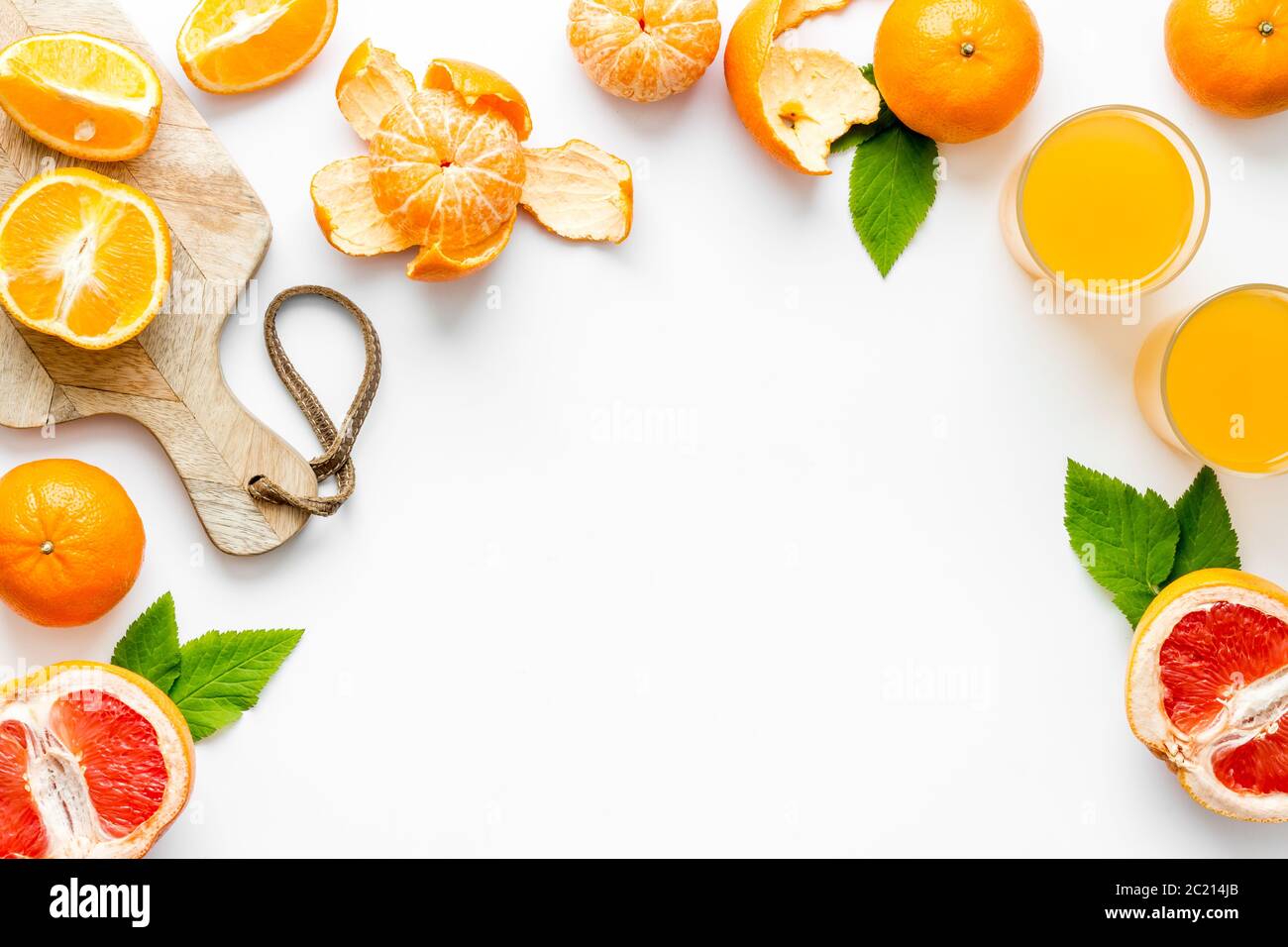 Frame with citrus fruits for juice top view Stock Photo - Alamy