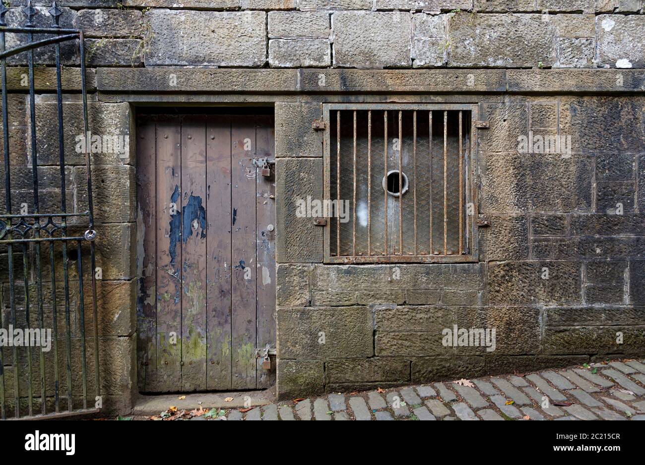 Landscape image of an ancient distressed wooden door with peeling ...