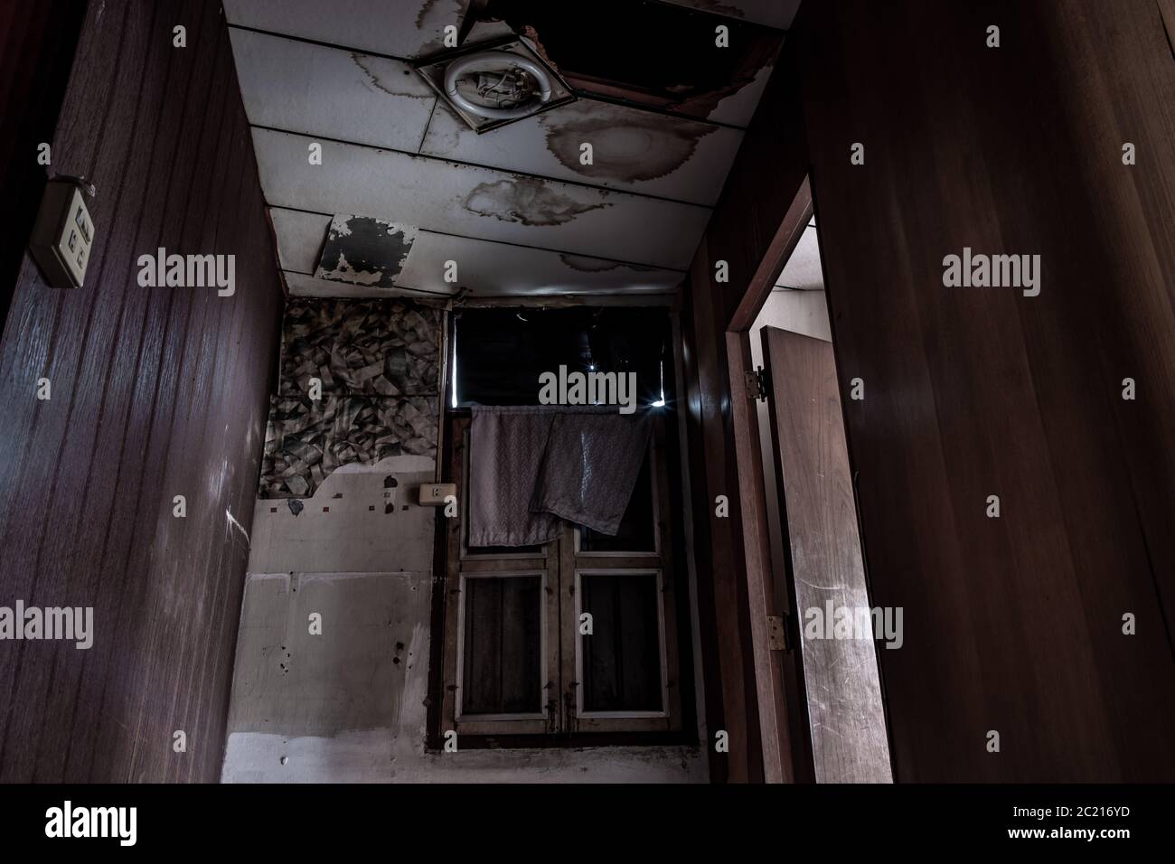 Bangkok, Thailand - Jan 19, 2020 : Abandoned room with window was left ...