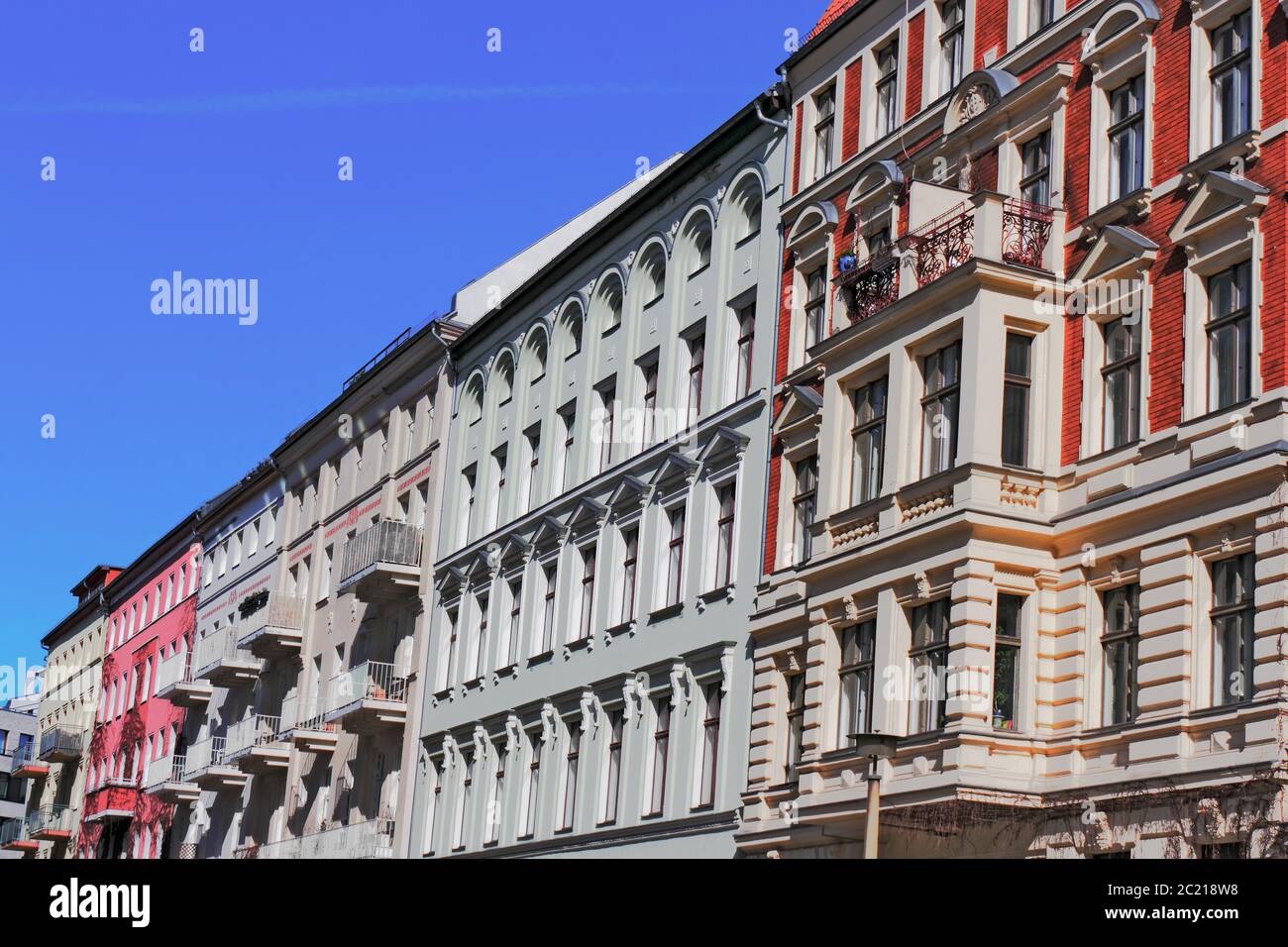 Renovated row of houses Stock Photo - Alamy