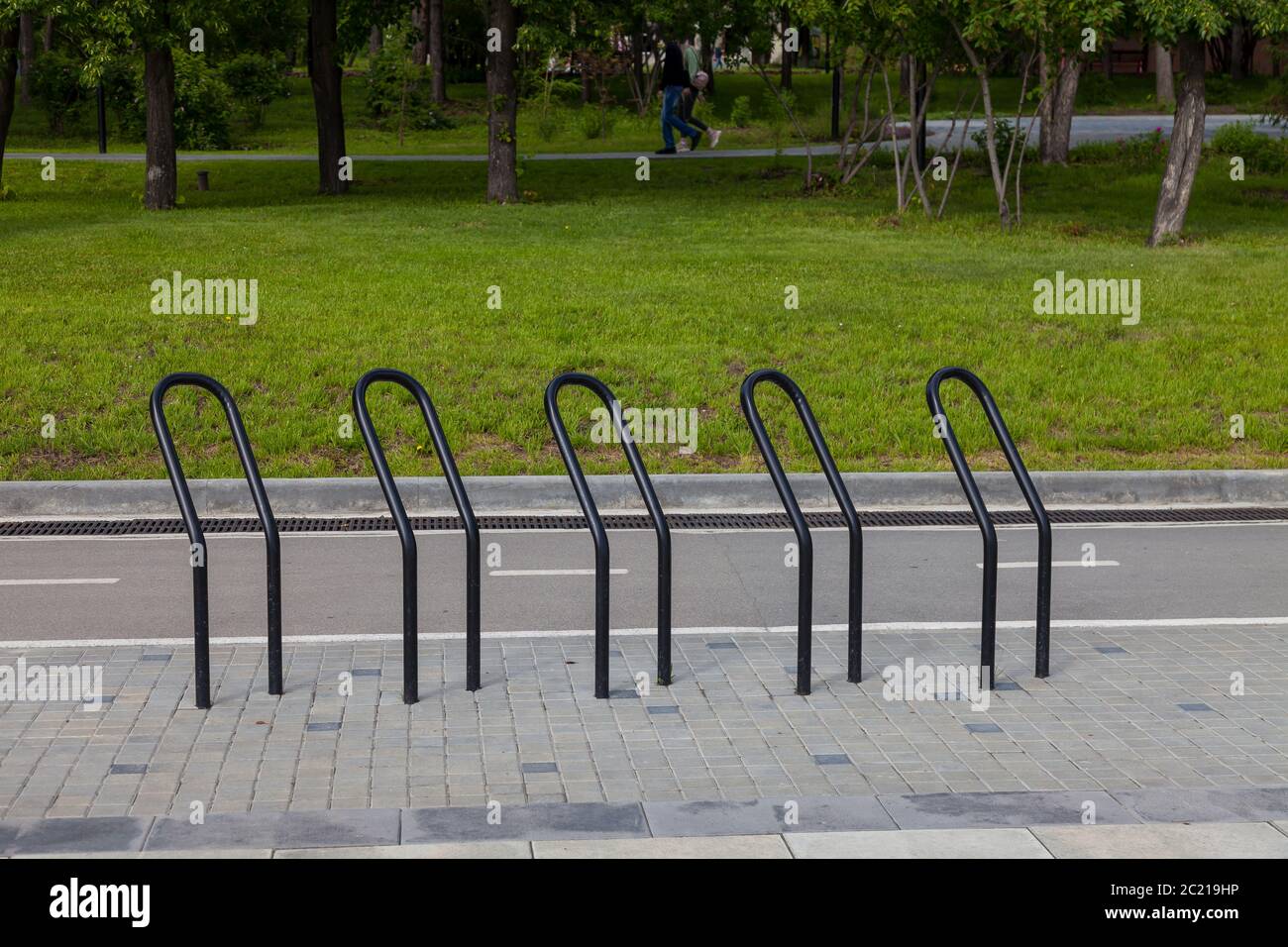 A special place with metallic black poles installed for parking ...