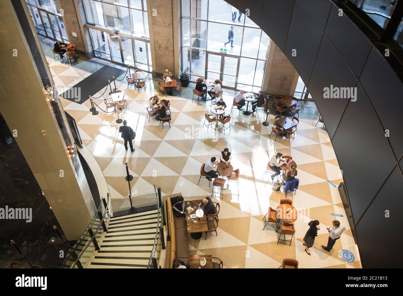 Office workers in the modern food court hi-res stock photography and ...