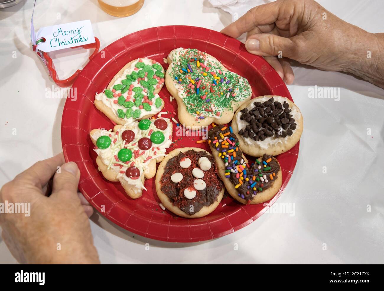 Decorating Christmas Cookies at a ladies gathering in church Stock ...
