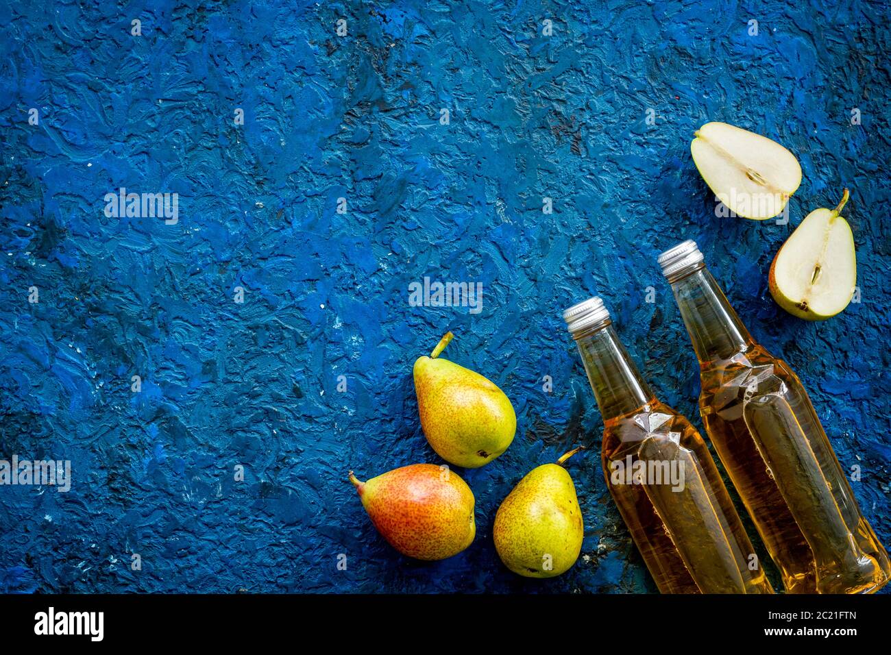 Bottles of beer with peer top view copy space Stock Photo - Alamy