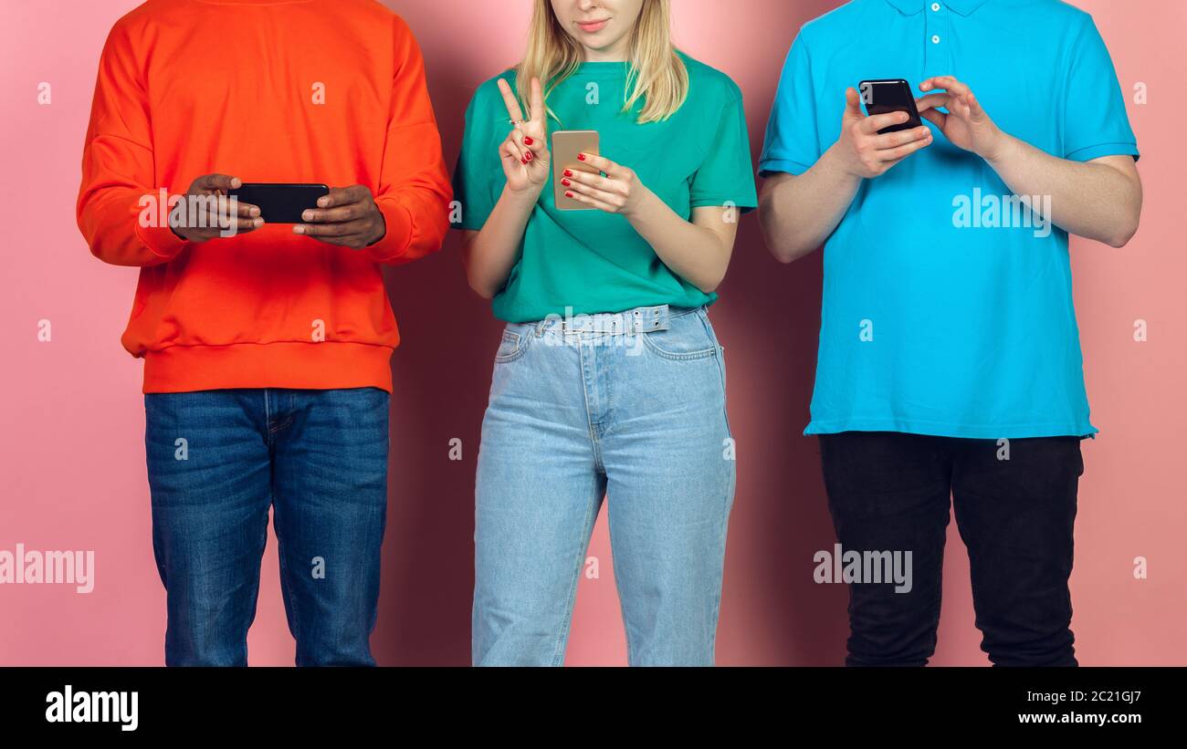 Group of friends using mobile smartphones. Teenagers addiction to new ...