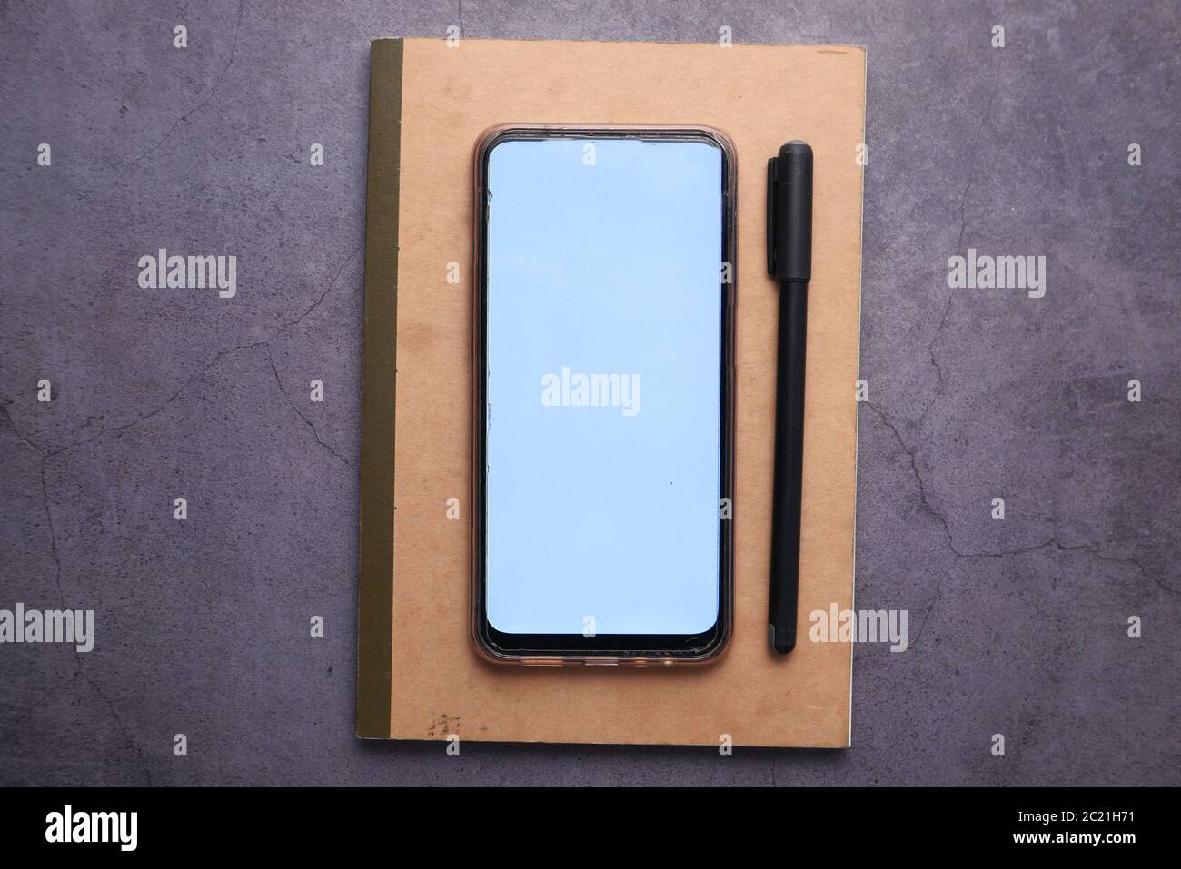 smart phone with empty screen on notepad Stock Photo - Alamy