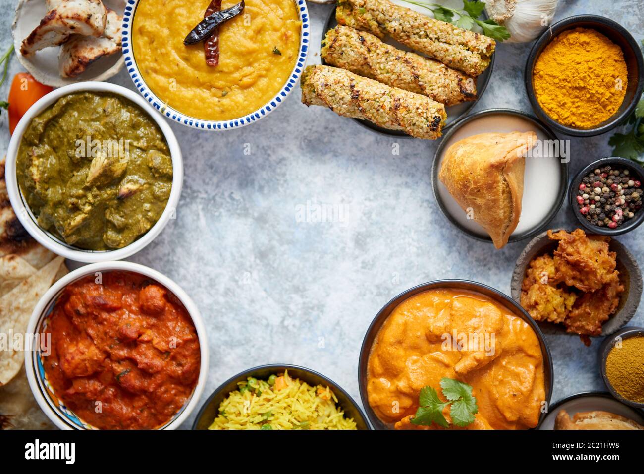 Assorted indian food on stone background. Dishes of indian cuisine ...