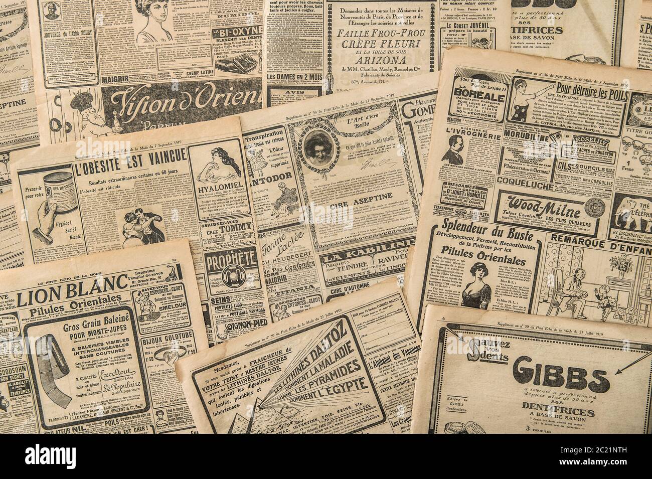Newspaper pages with antique advertising. Vintage fashion magazine for ...