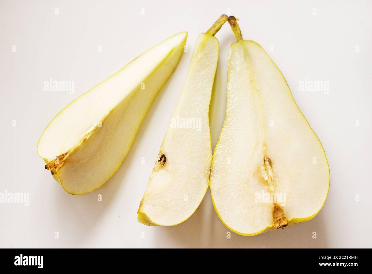 pear cut into pieces, together and apart Stock Photo - Alamy