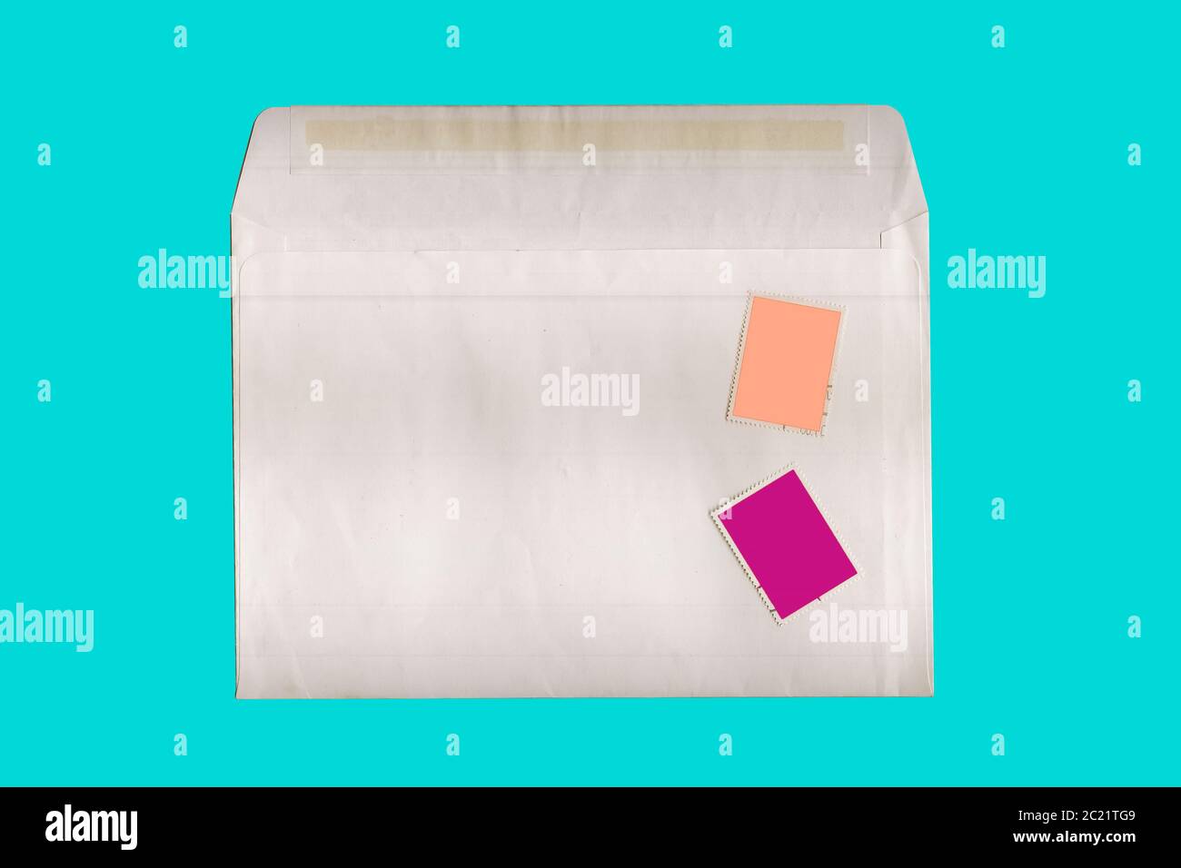 Open Envelope with two postage stamps. Blank envelope, back side ...