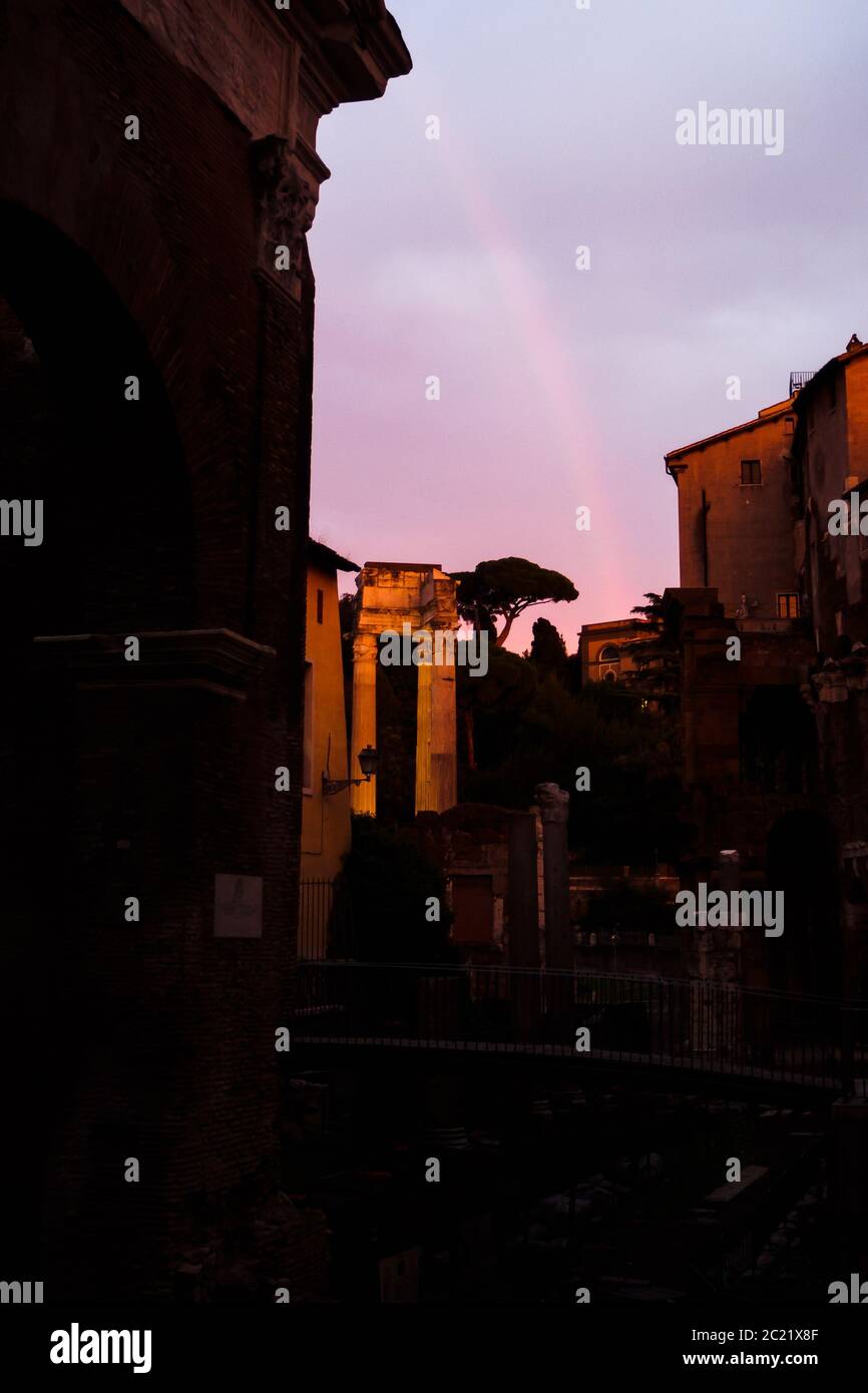 Rainbow at sunset over the ruins of the Roman Forum next to the ...