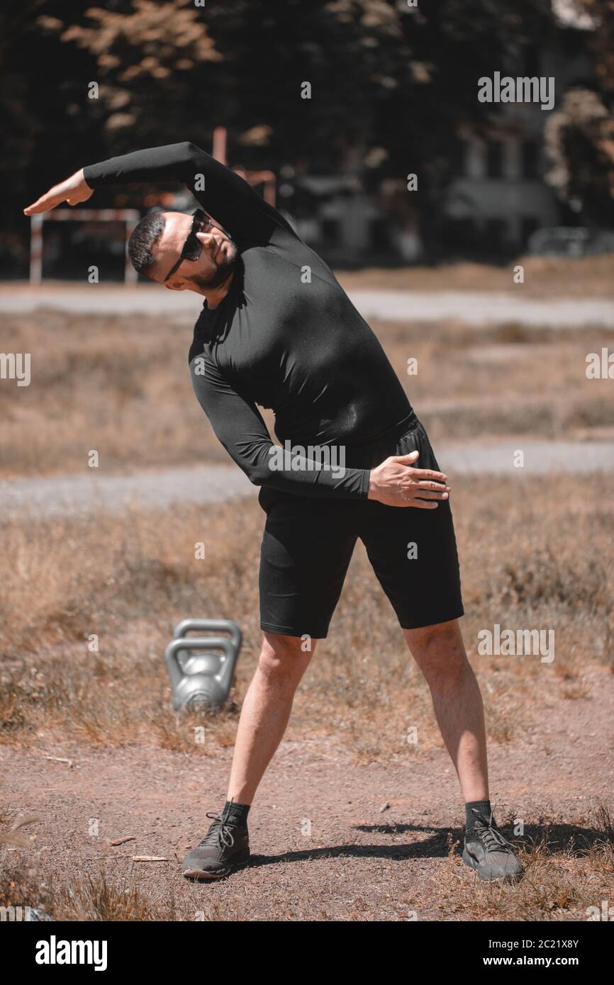 Muscular young handsome man walking hi-res stock photography and images ...