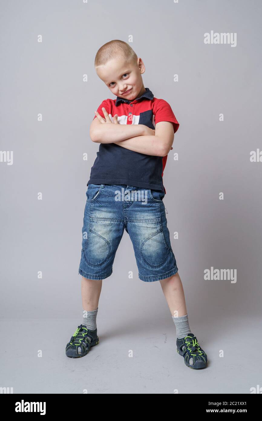 Young pretty boy posing at studio as a fashion model Stock Photo - Alamy