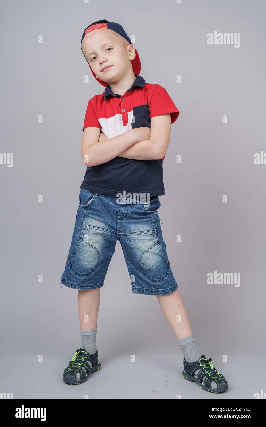 Young pretty boy posing at studio as a fashion model Stock Photo - Alamy