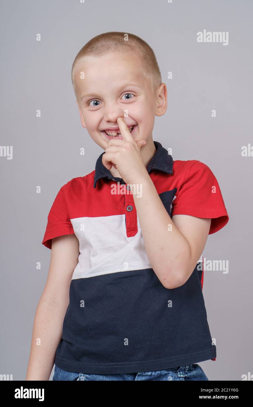 Young pretty boy posing at studio as a fashion model Stock Photo - Alamy