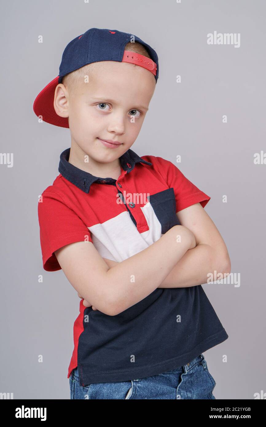 Young pretty boy posing at studio as a fashion model Stock Photo - Alamy