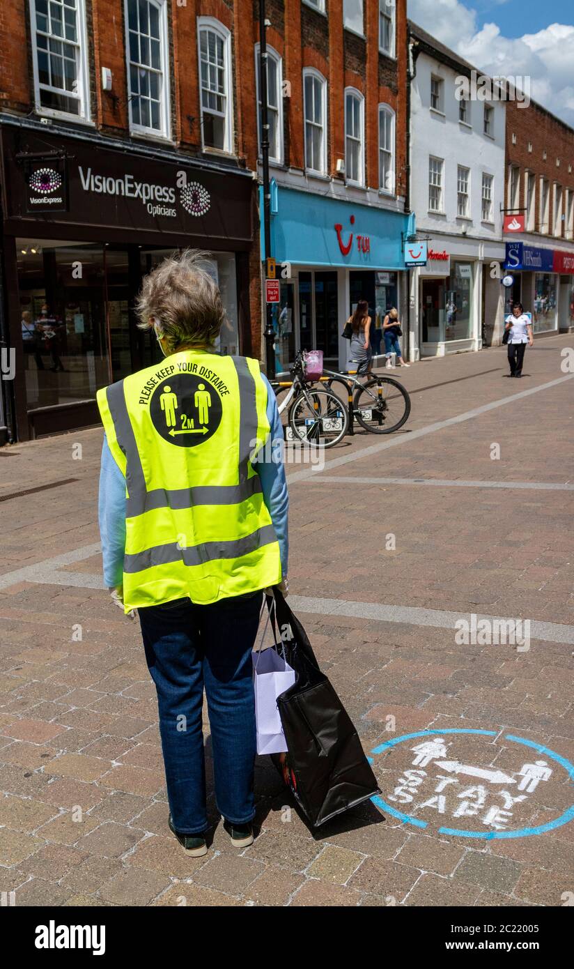 Newbury, Berkshire, England, UK. June 2020. Elderly woman shopper ...