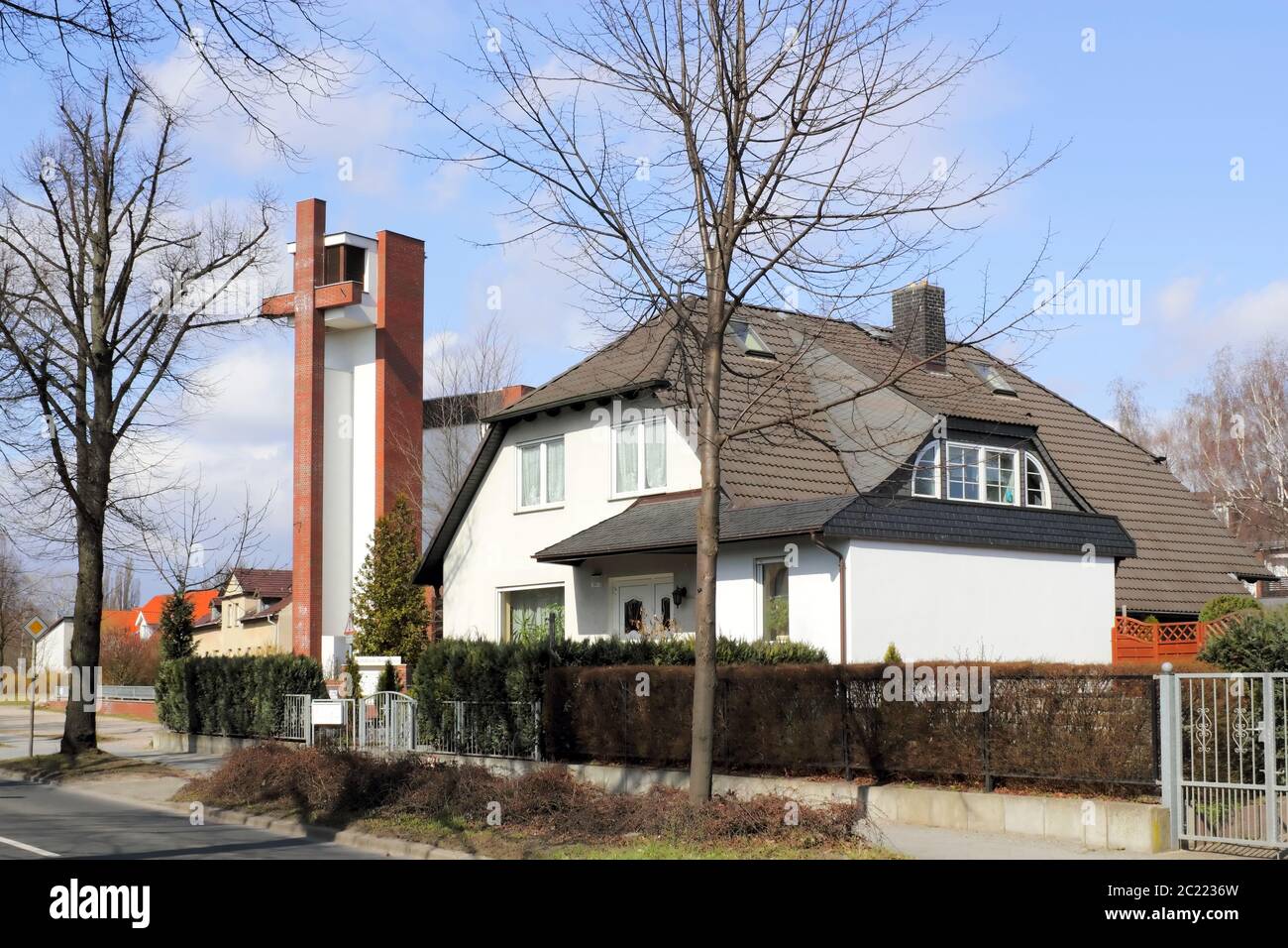 Residential house and church Stock Photo - Alamy