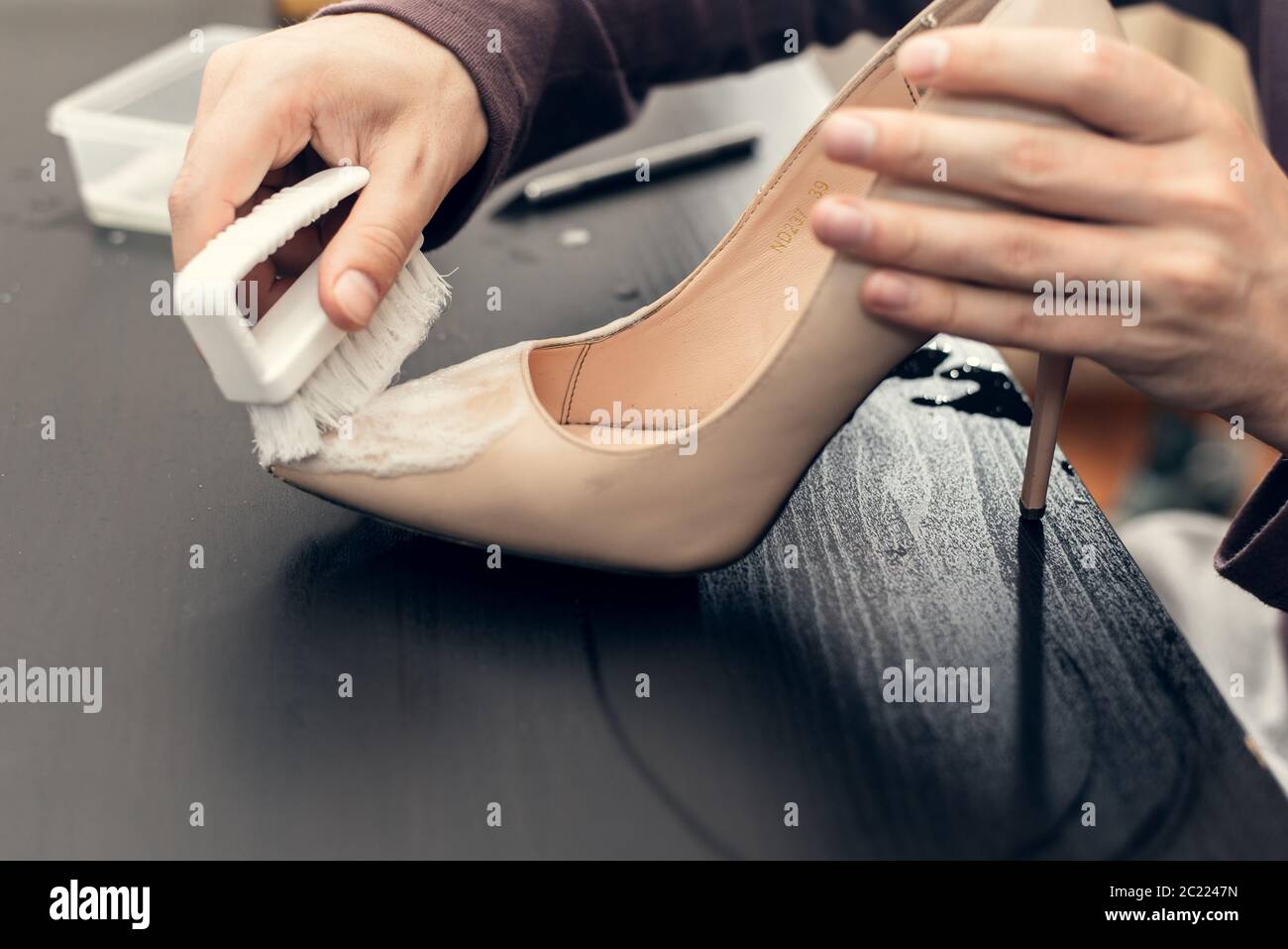 Cleaning shoes hi-res stock photography and images - Alamy