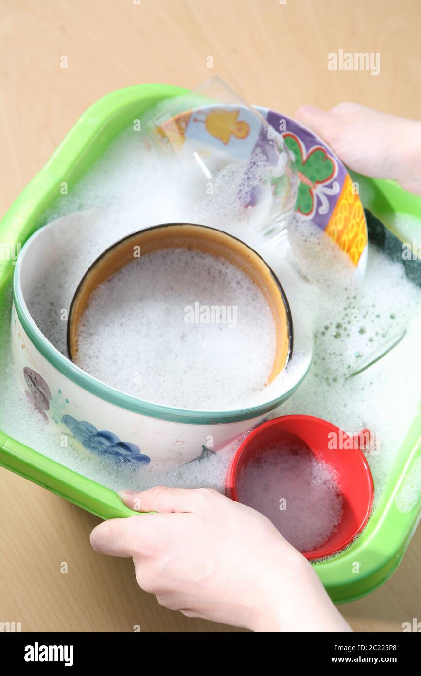 close-up of female hands washing dishes Stock Photo - Alamy