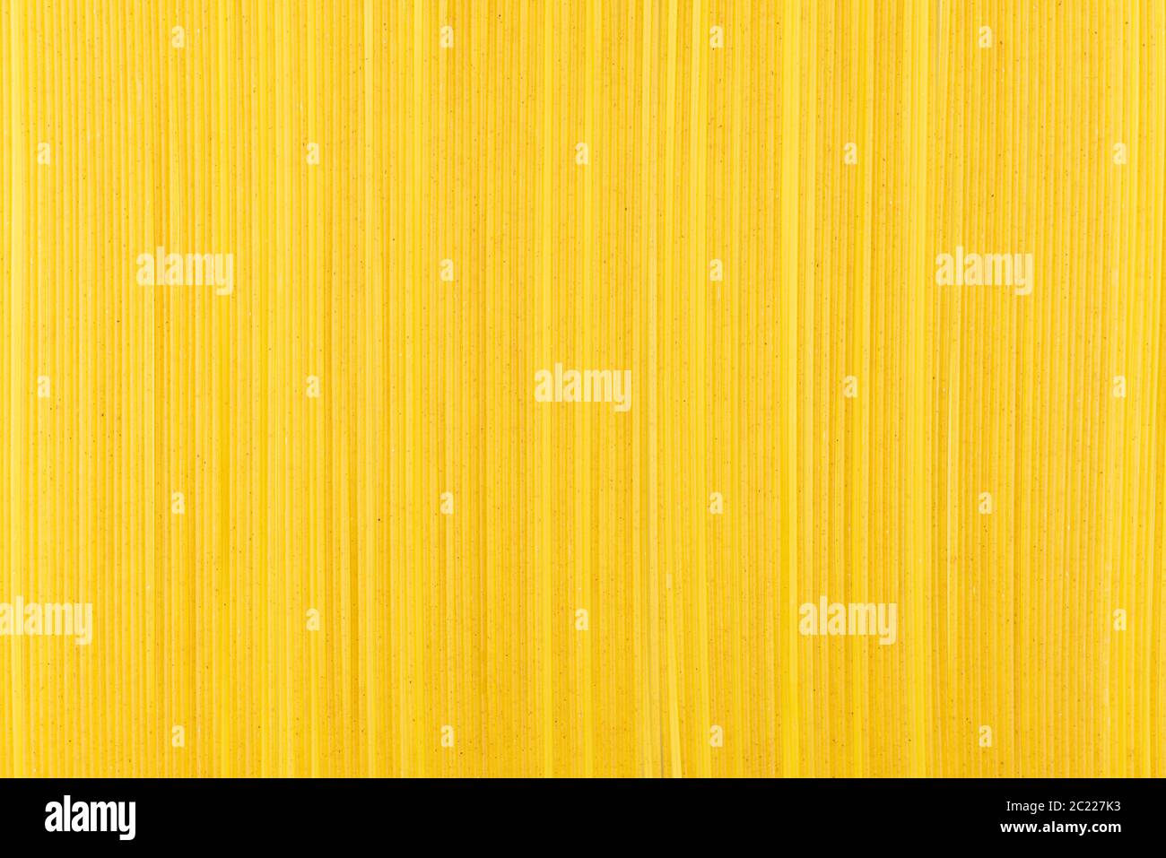 Uncooked bright yellow spaghetti hi-res stock photography and images ...
