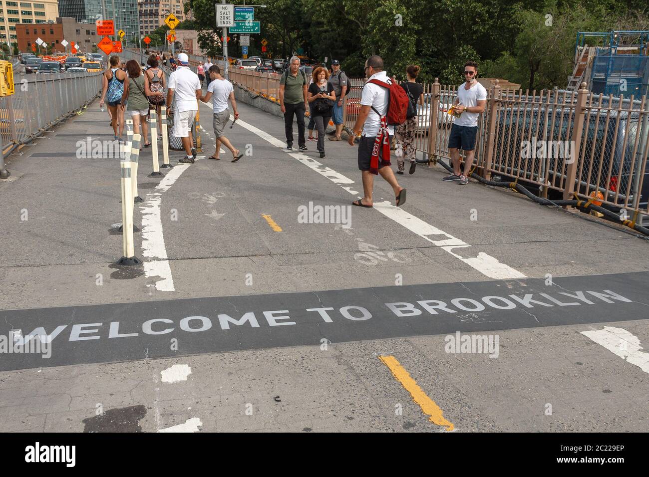 A sign at one end of the Brooklyn Bridge saying Welcome to Brooklyn ...