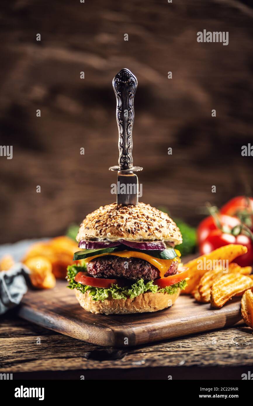 Stabbed hamburger hi-res stock photography and images - Alamy