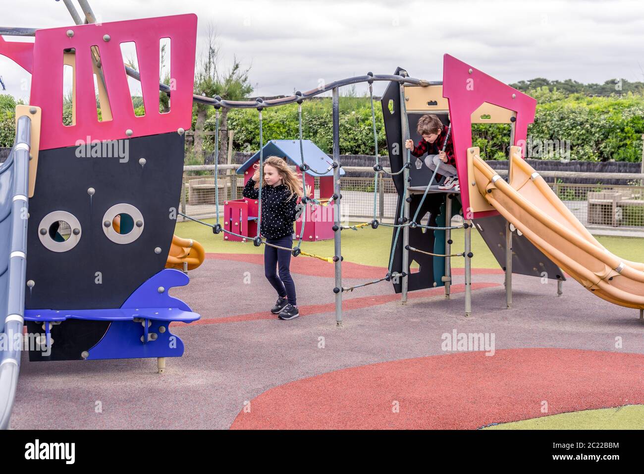 the children playing outdoor in the playground Stock Photo - Alamy