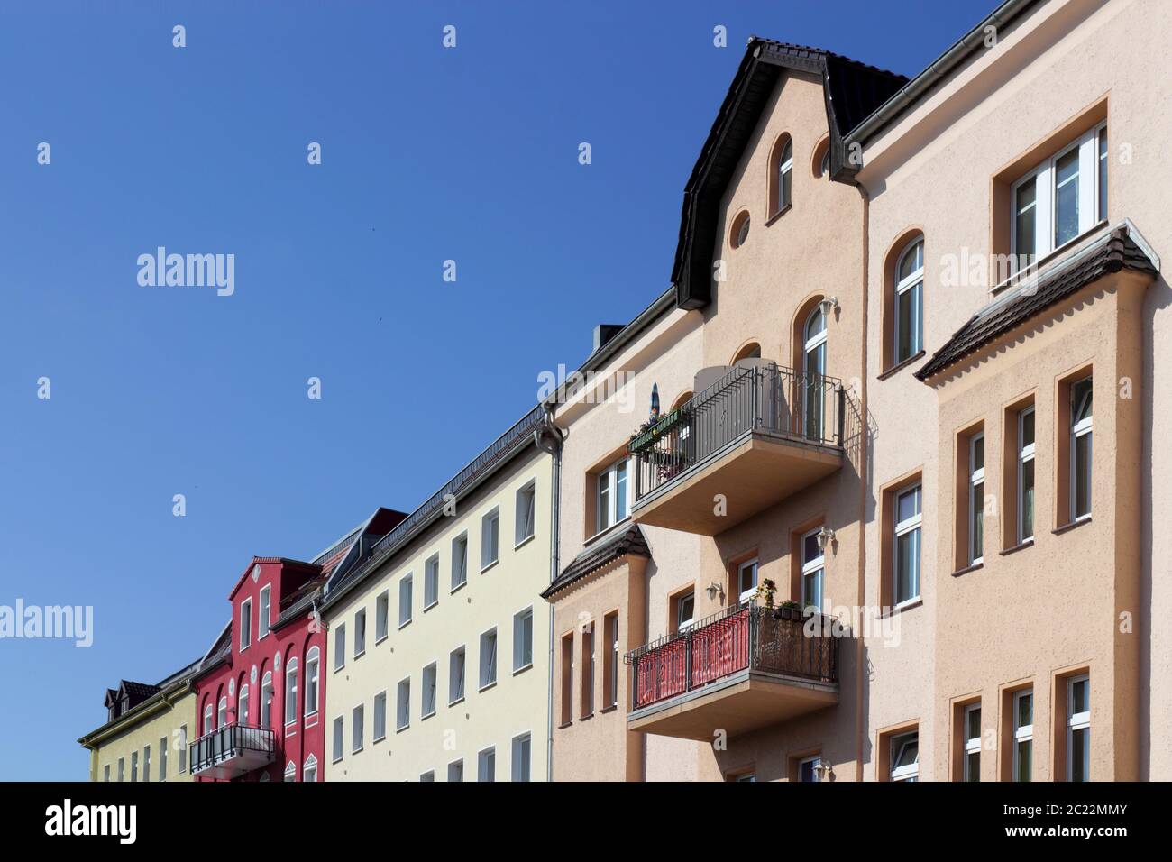 Renovated row of houses Stock Photo - Alamy