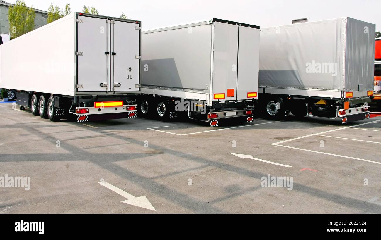 Three Truck Trailers Semi at Parking Lot Stock Photo - Alamy