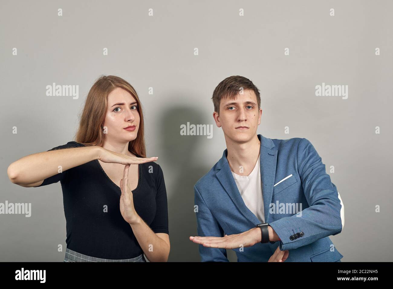 Time out gesture, break, doing t symbol or sign with help of hands ...