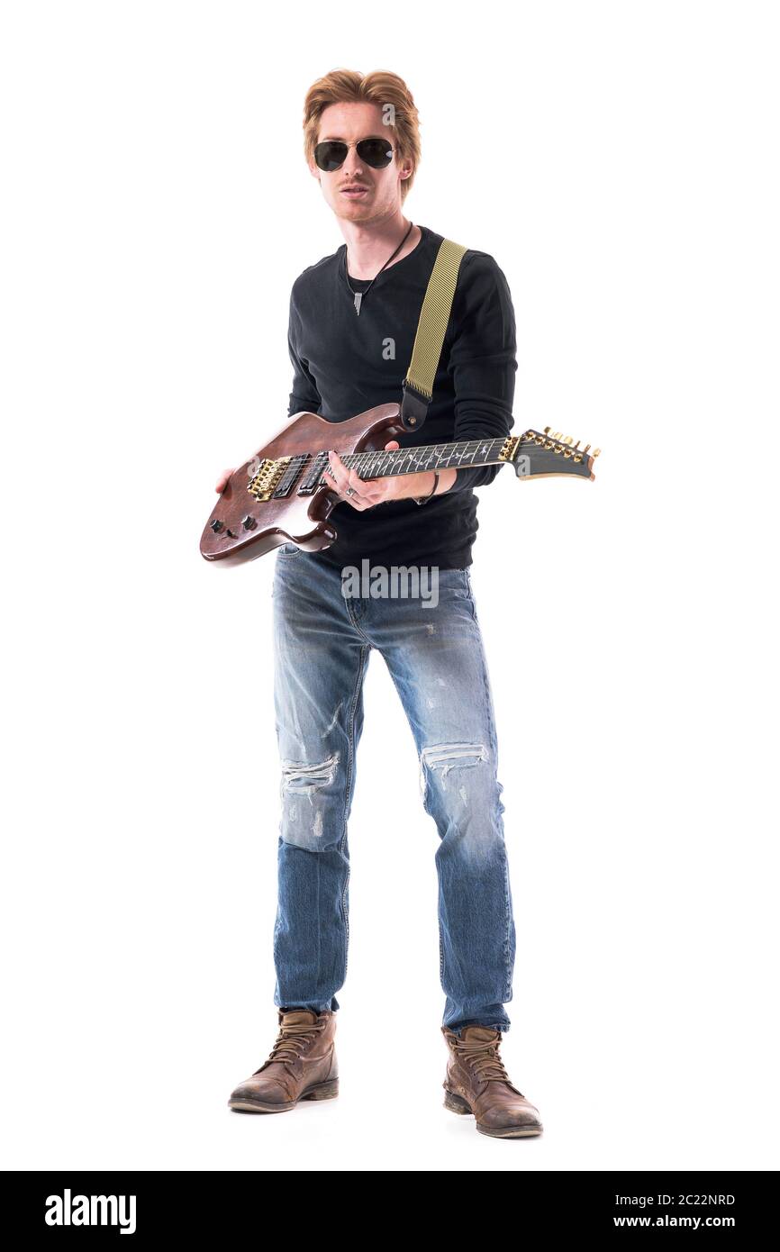 Cool relaxed handsome red hair man rock music guitarist posing at ...