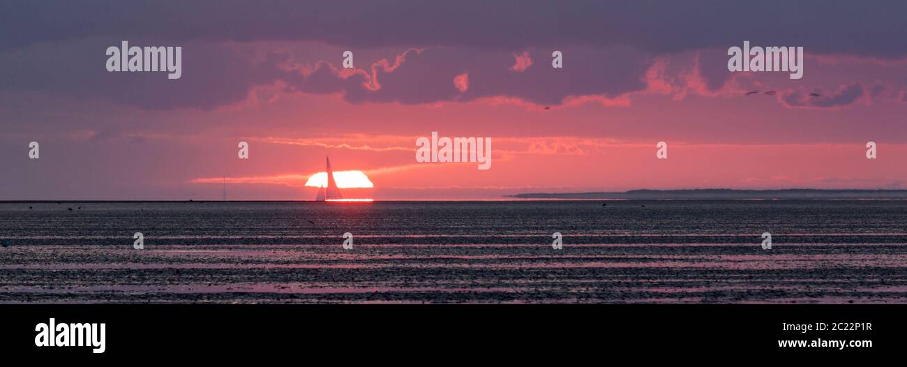 Sail into sunrise Stock Photo - Alamy