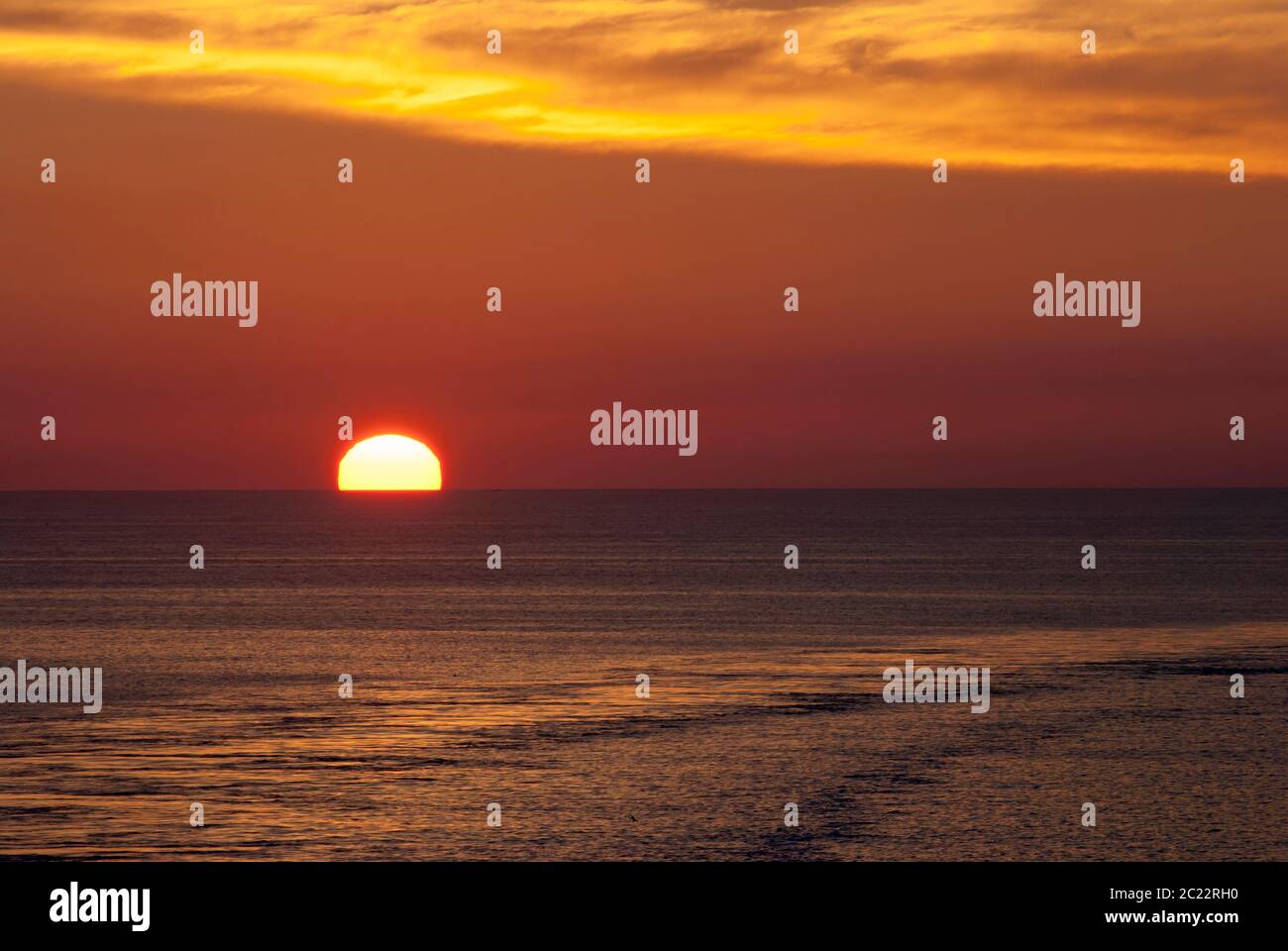 The view of a sun rising above the horizon outside Boston ...