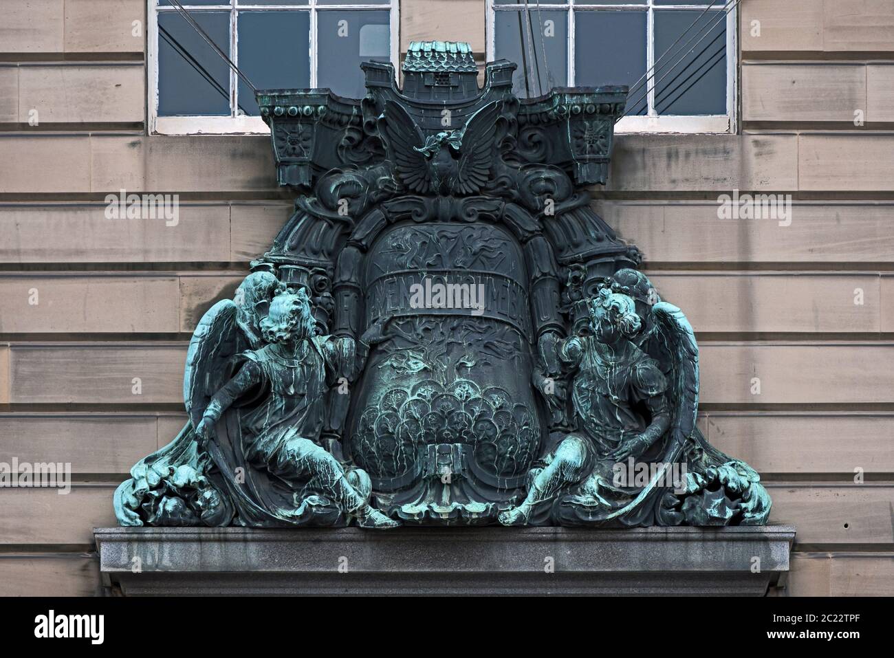 Sculpture of the "Burning Bush" emblem above the entrance to the Church ...